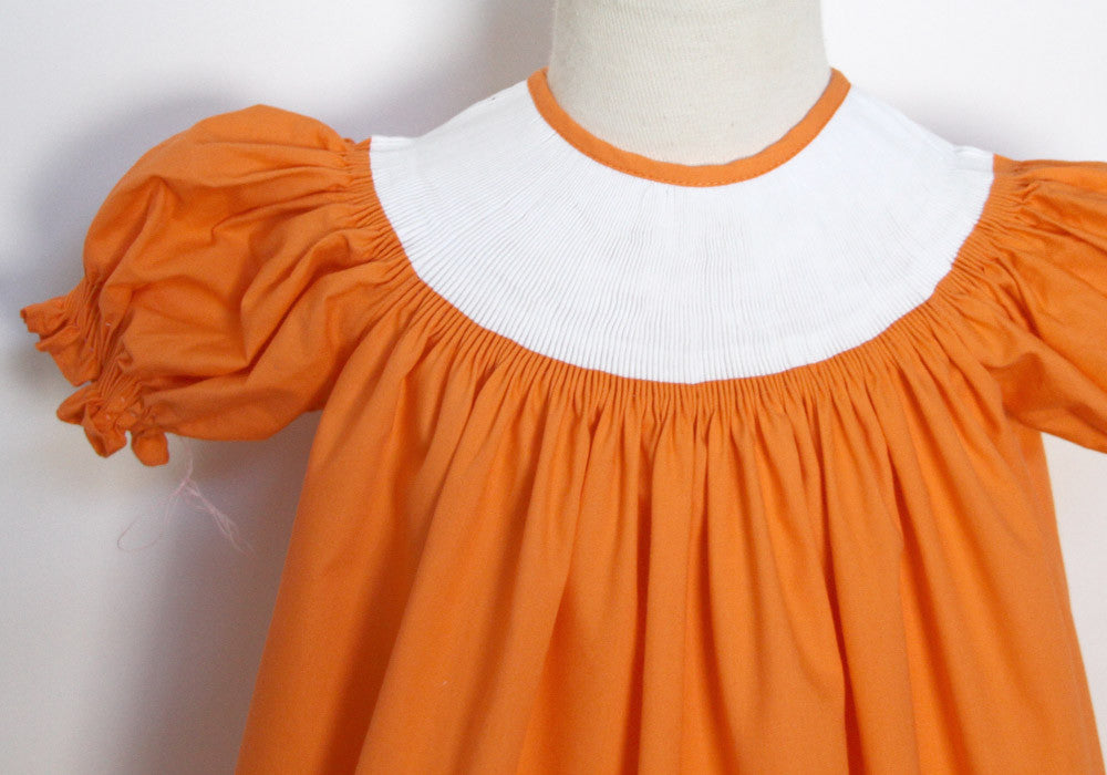 Ready to Smock Your Girls Smocking Plate in This Orange Bishop Dress